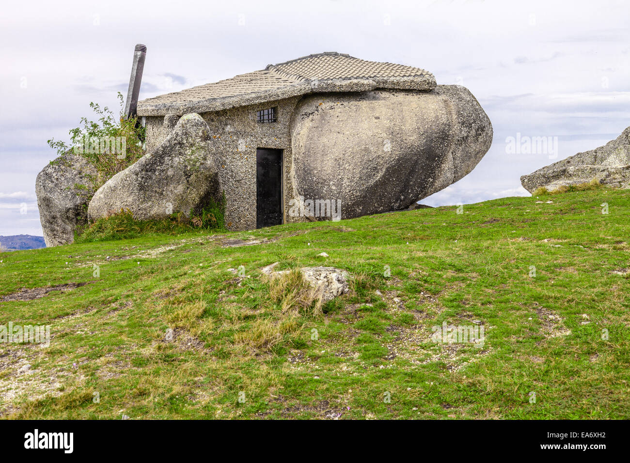 Casa do Penedo, a house built between huge rocks in Fafe, Portugal ...