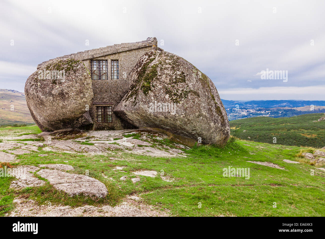 Casa do Penedo, a house built between huge rocks in Fafe, Portugal ...