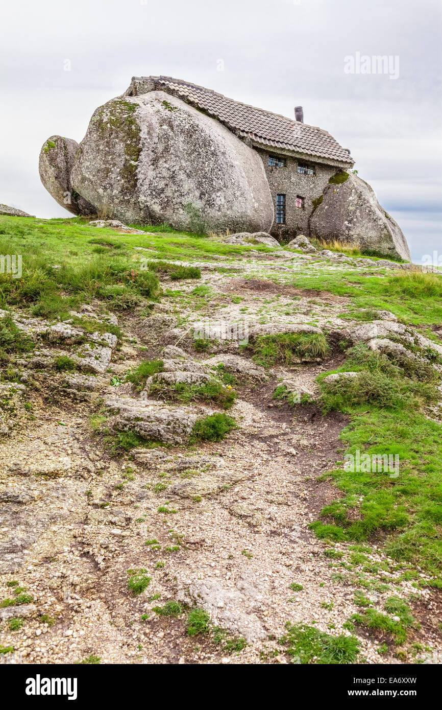 Casa do Penedo, a house built between huge rocks in Fafe, Portugal ...