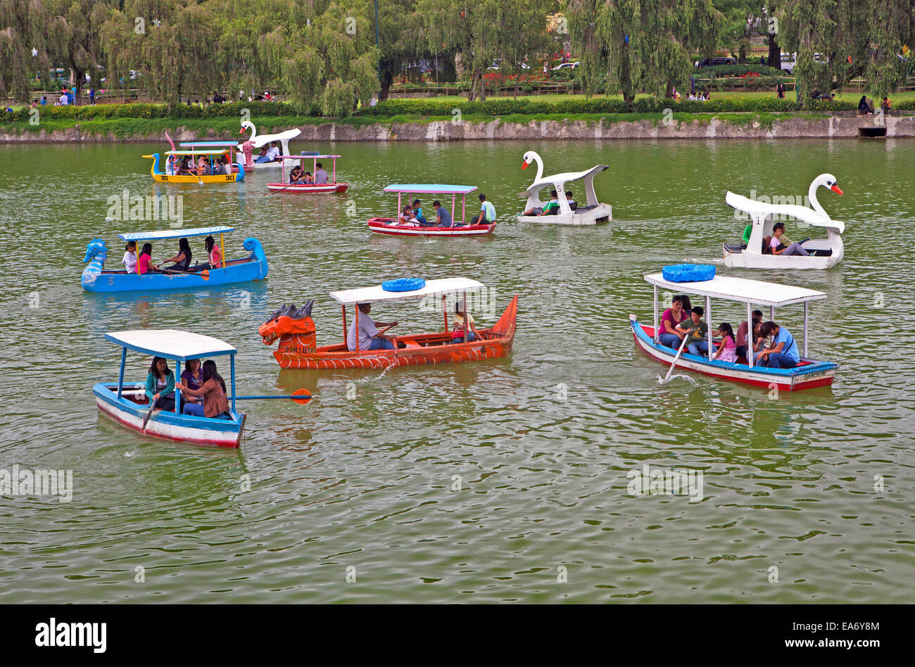 Filipino families and tourists enjoy an afternoon on Burnham Pond in ...