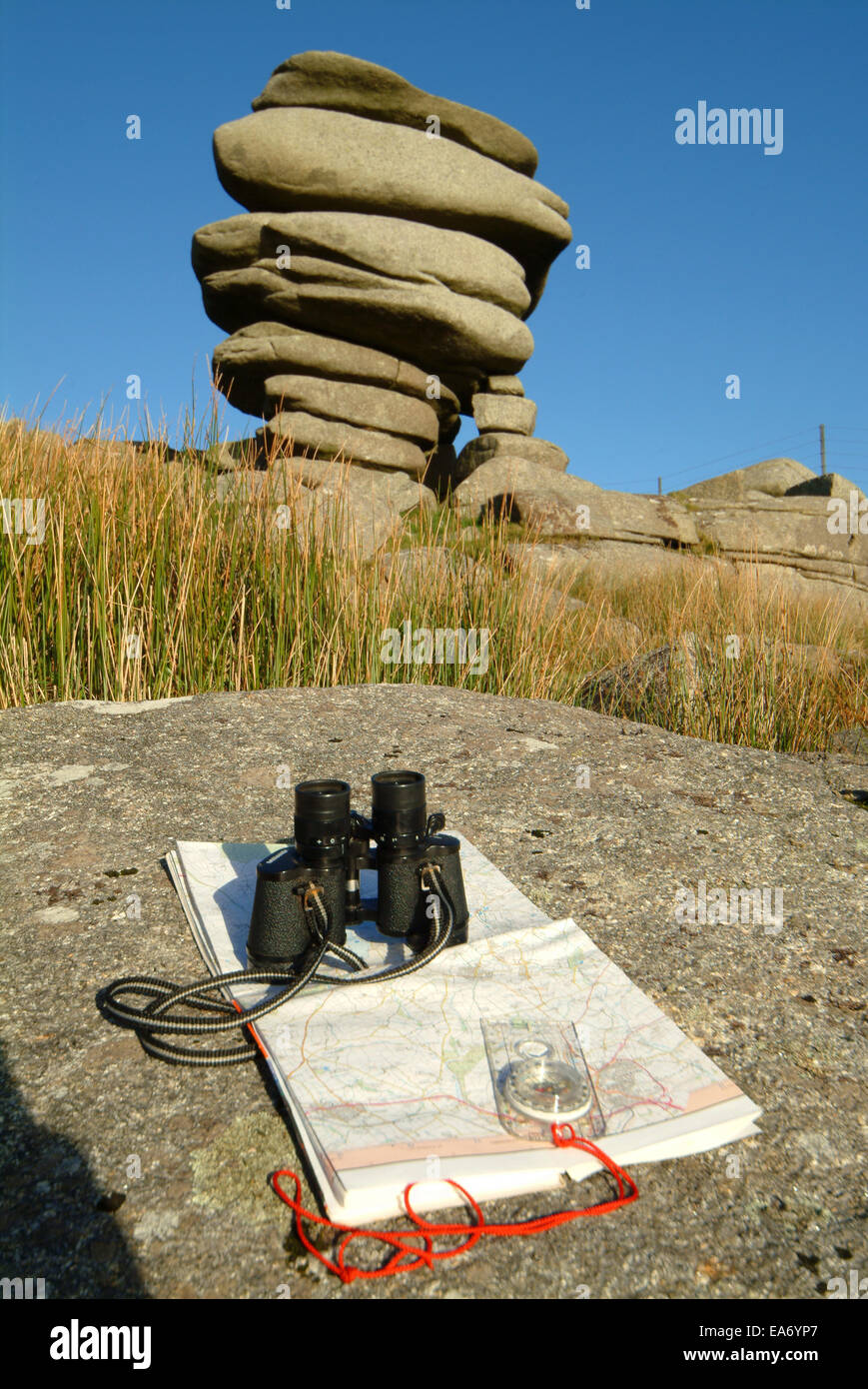 Binoculars map and compass at Cheesewring rock on Bodmin Moor Stock ...