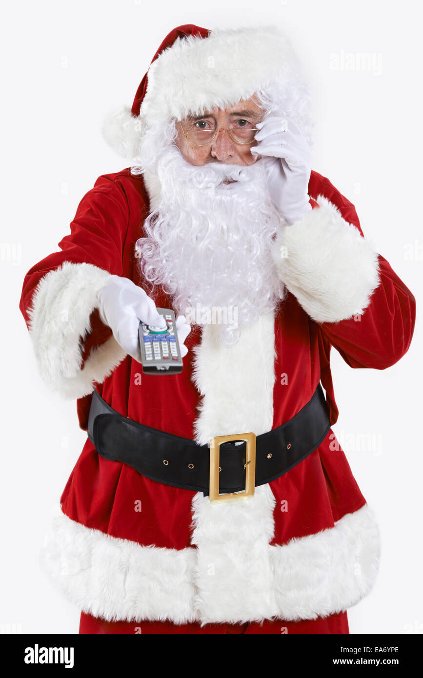 Santa Claus Holding Television Remote Control Stock Photo - Alamy