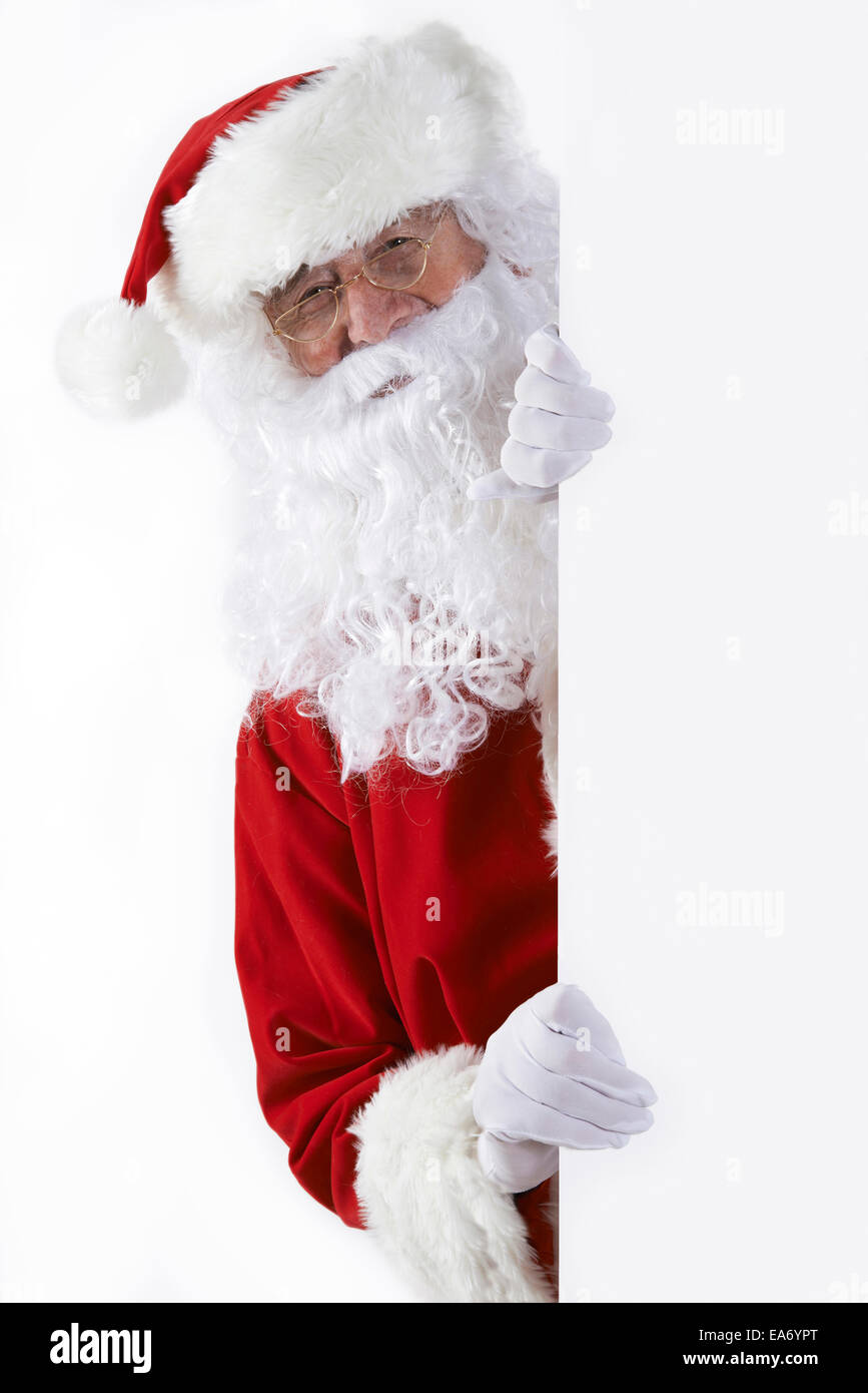 Santa Claus Looking Round Blank White Wall Stock Photo - Alamy