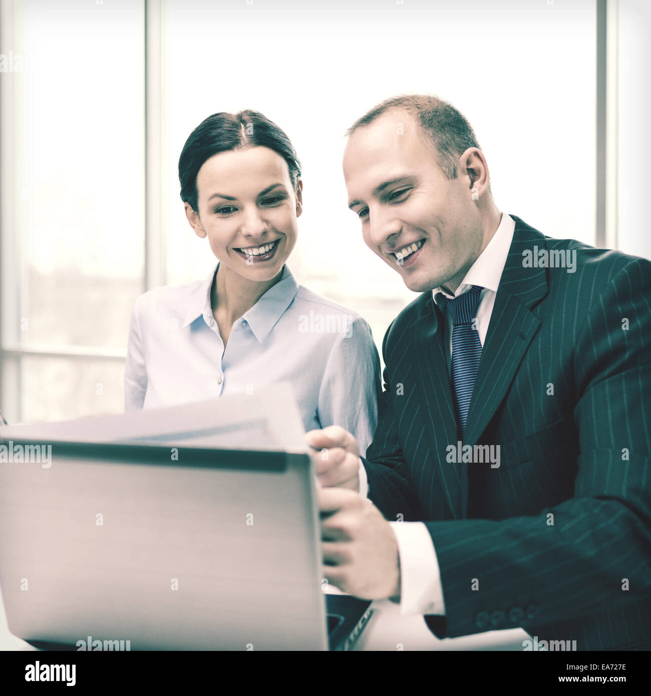 businessman and businesswoman having discussion Stock Photo - Alamy