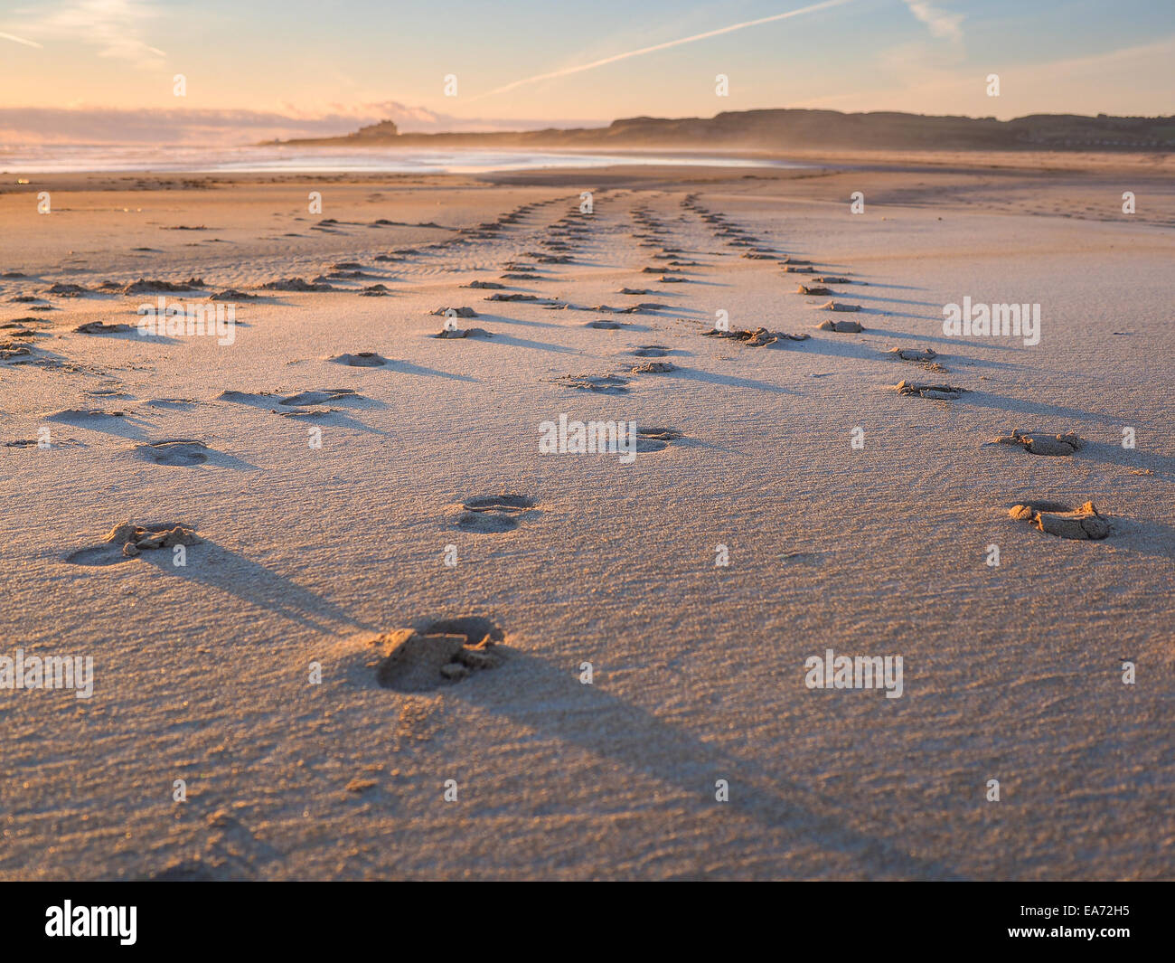 a gloriously wide sandy beach that seems to stretch for miles into the ...