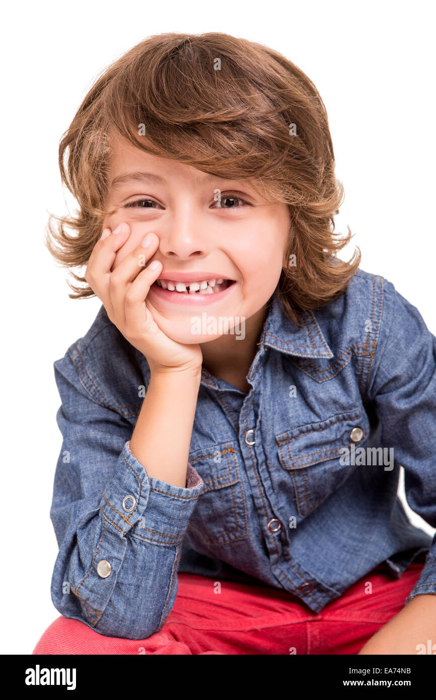 Lovely caucasian blonde kid posing for camera Stock Photo - Alamy