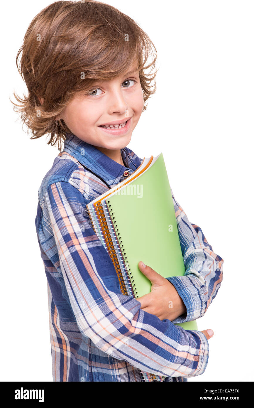 Little boy holding school books over white Stock Photo - Alamy