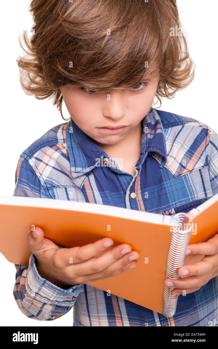Blond cute boy reading a book over white Stock Photo - Alamy
