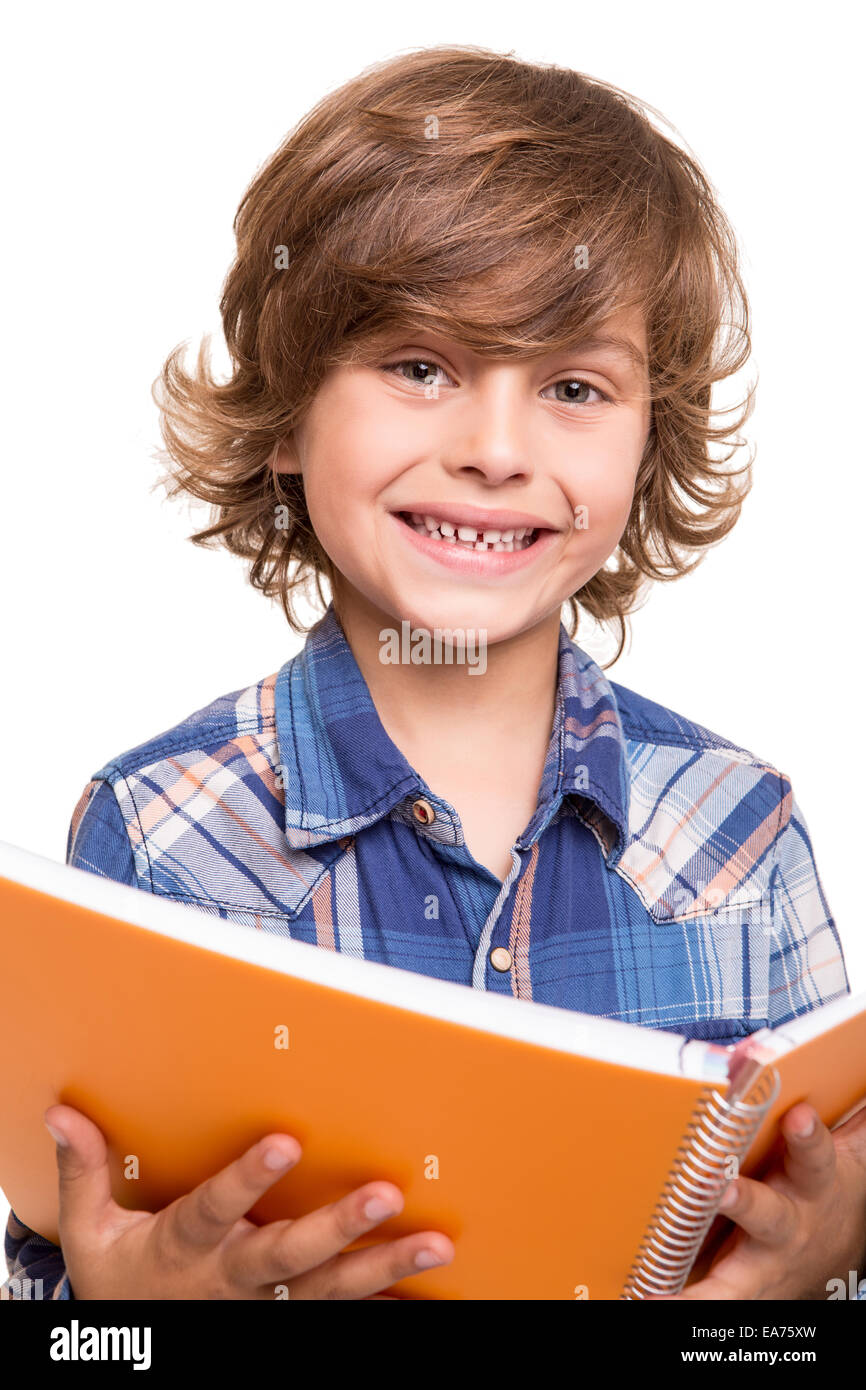 Blond cute boy reading a book over white Stock Photo - Alamy