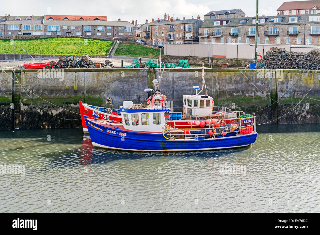 Two fishing boats in the harbour at Seahouses, Northumberland Stock ...
