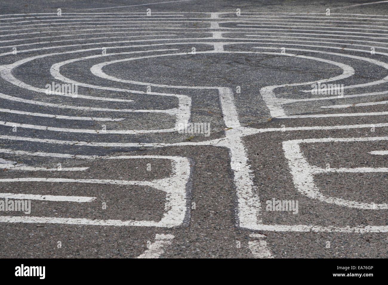 Labyrinth painted onto an asphalt parking lot Stock Photo - Alamy