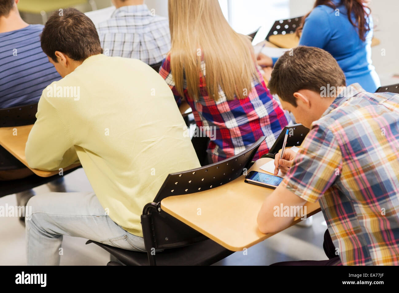group of students in classroom Stock Photo - Alamy