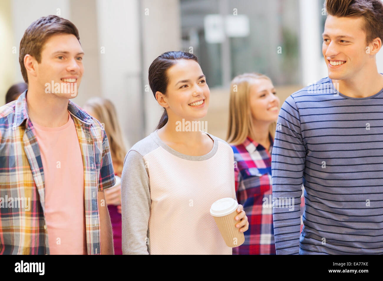group of smiling students with paper coffee cups Stock Photo - Alamy