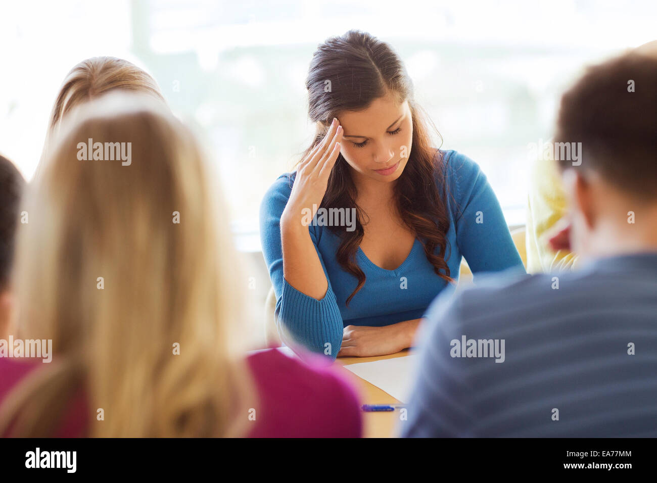 group of students with papers Stock Photo - Alamy