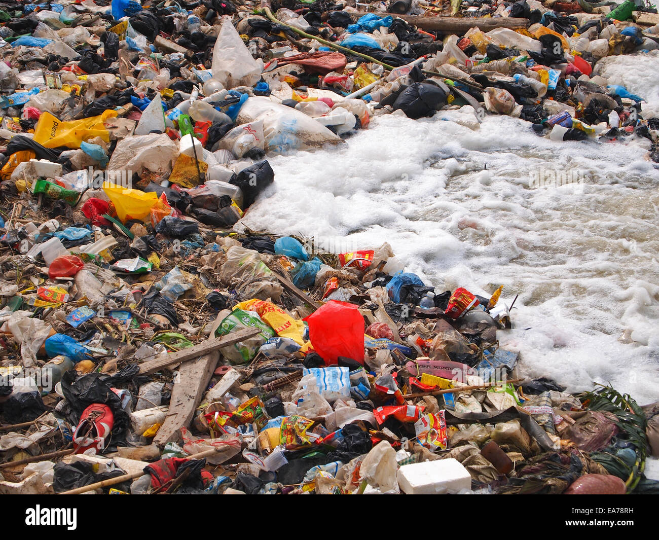 Garbage on the river shore Stock Photo - Alamy