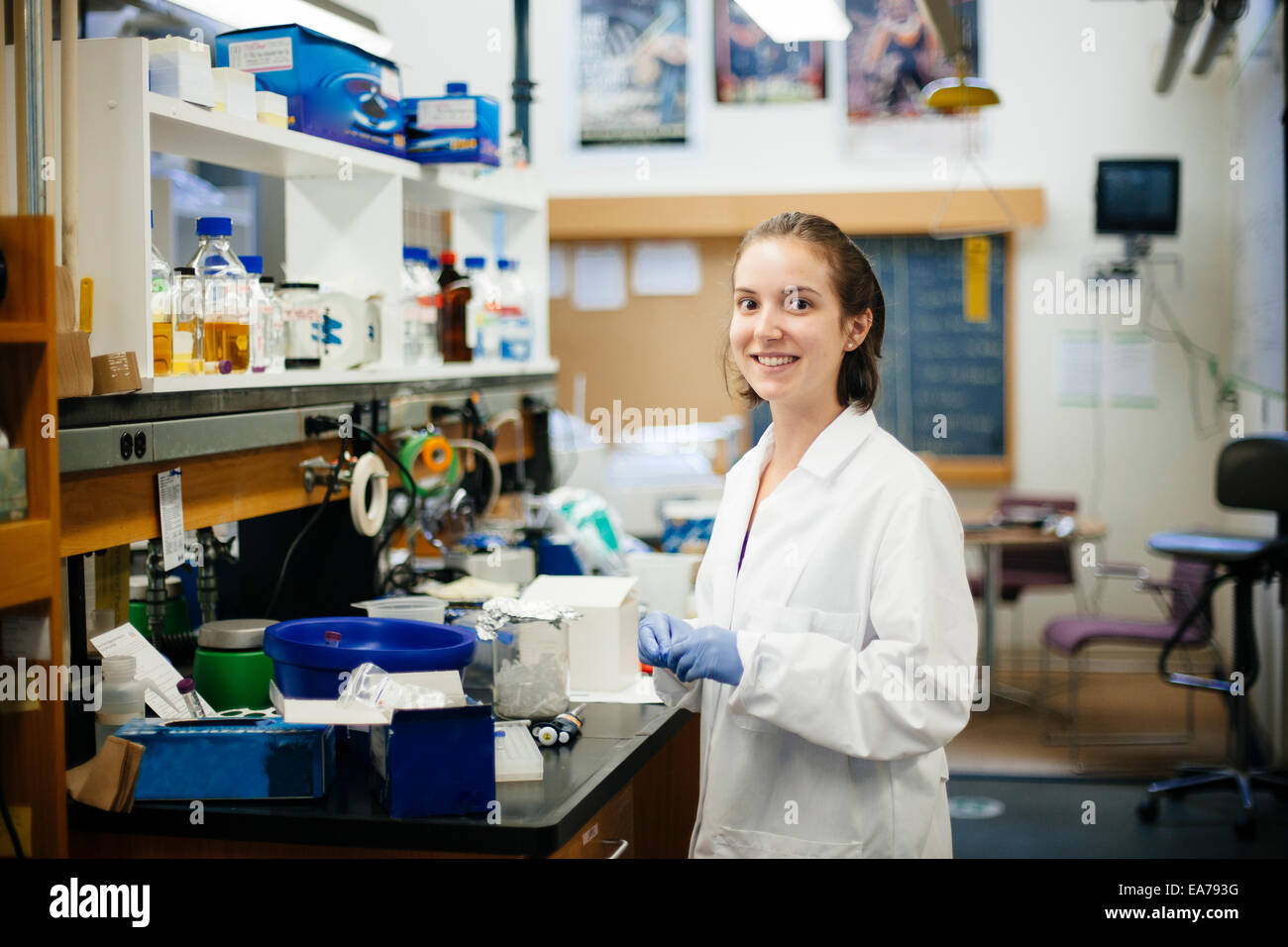 Portrait of female science student standing in laboratory Stock Photo ...