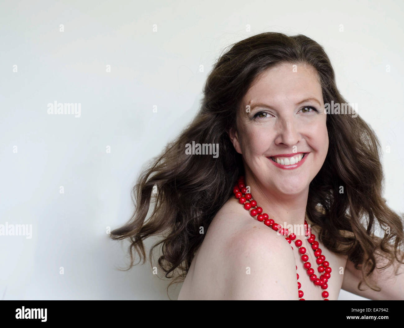 Portrait smiling mid adult woman hi-res stock photography and images ...