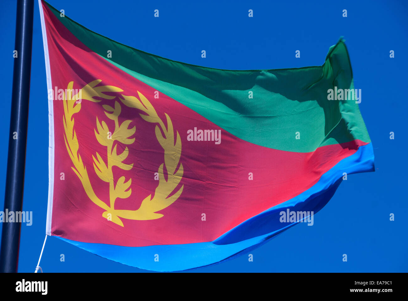 eritrea flag and blue sky Stock Photo - Alamy