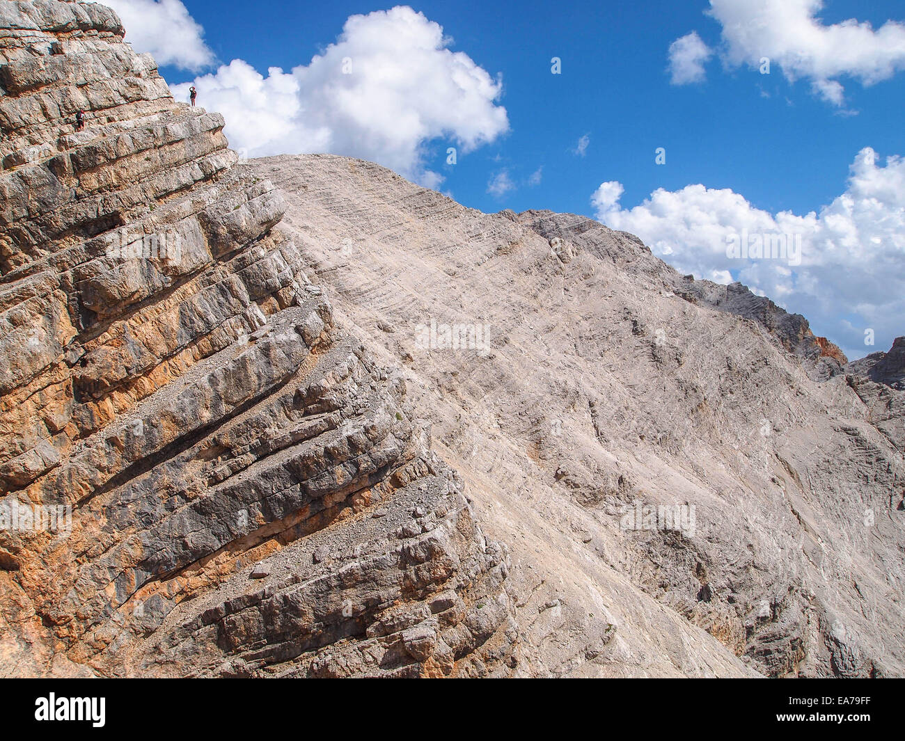 climbers are ascending the mountain via ferrata, Italy, Dolomites Stock ...