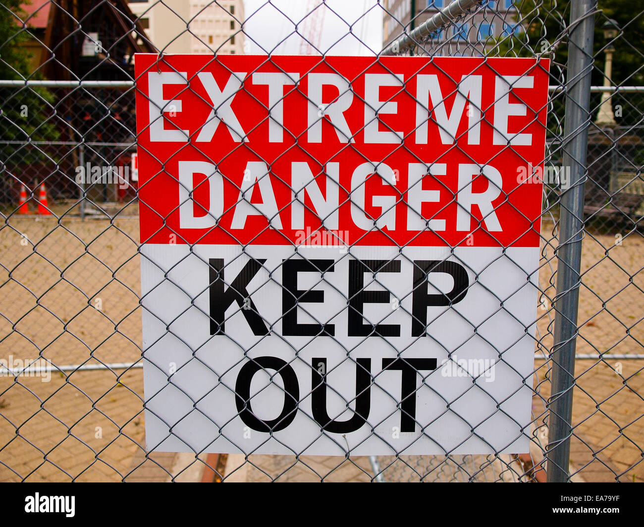 warning sign posted on the fence Stock Photo - Alamy