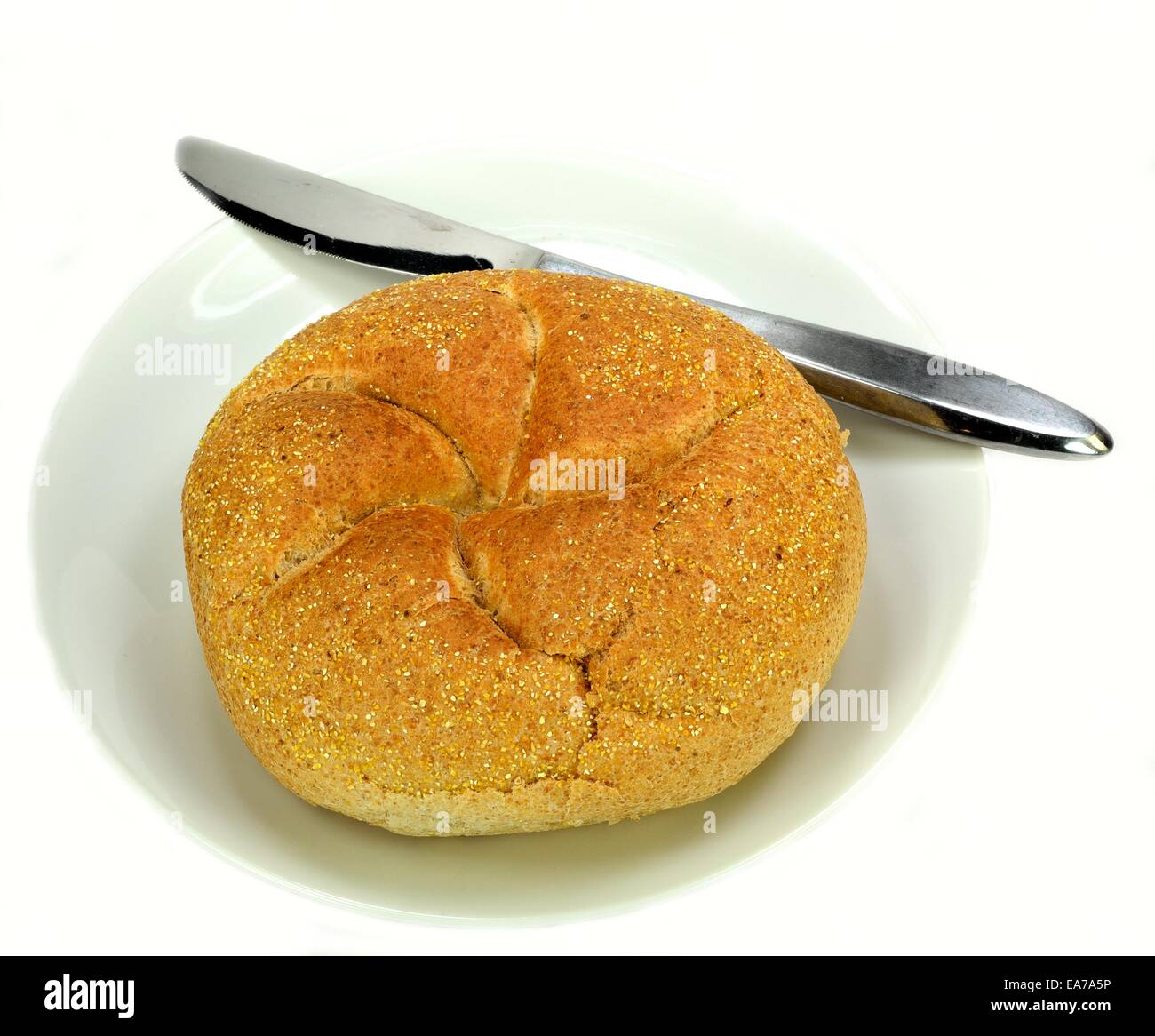 Whole wheat kaiser roll on a white background Stock Photo - Alamy