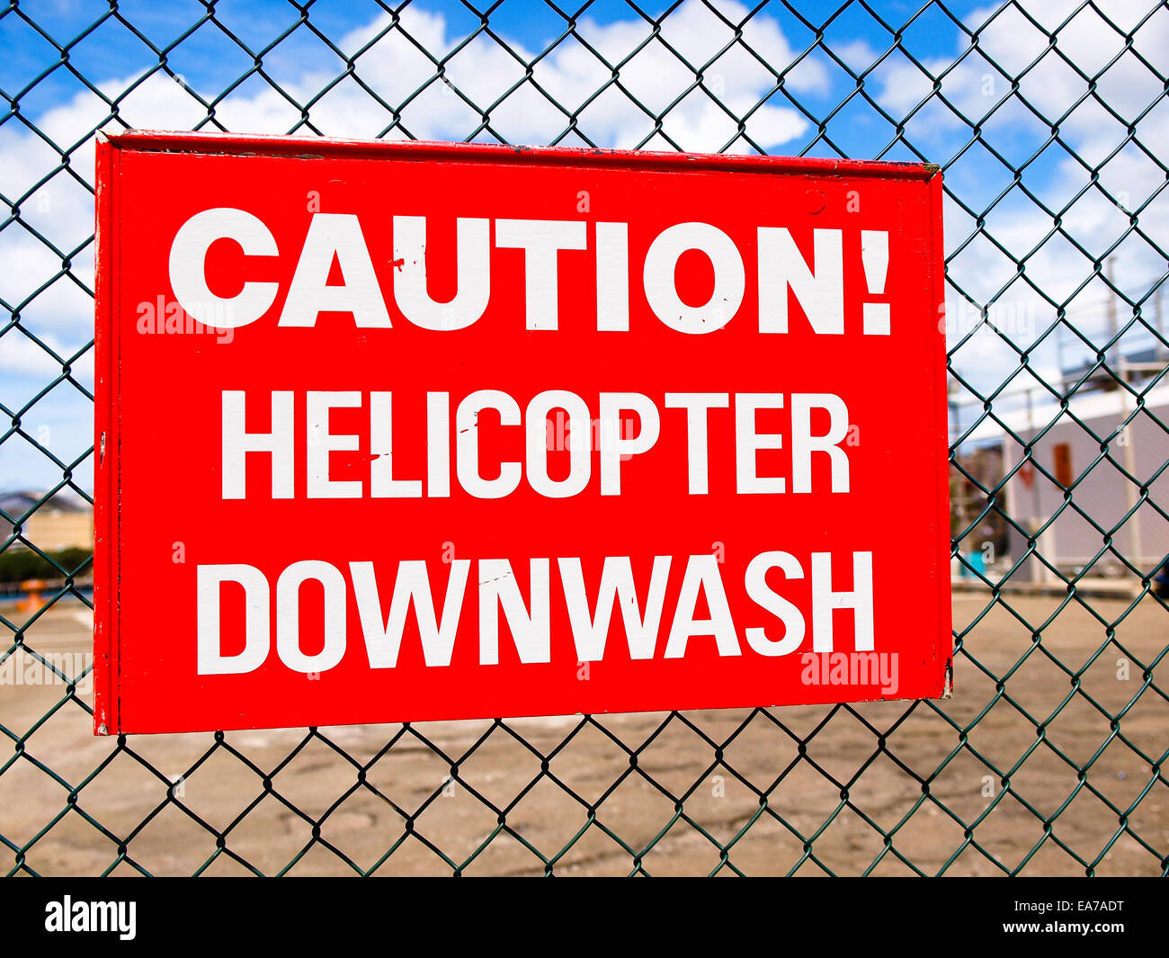 Caution Helicopter downwash sign Stock Photo - Alamy