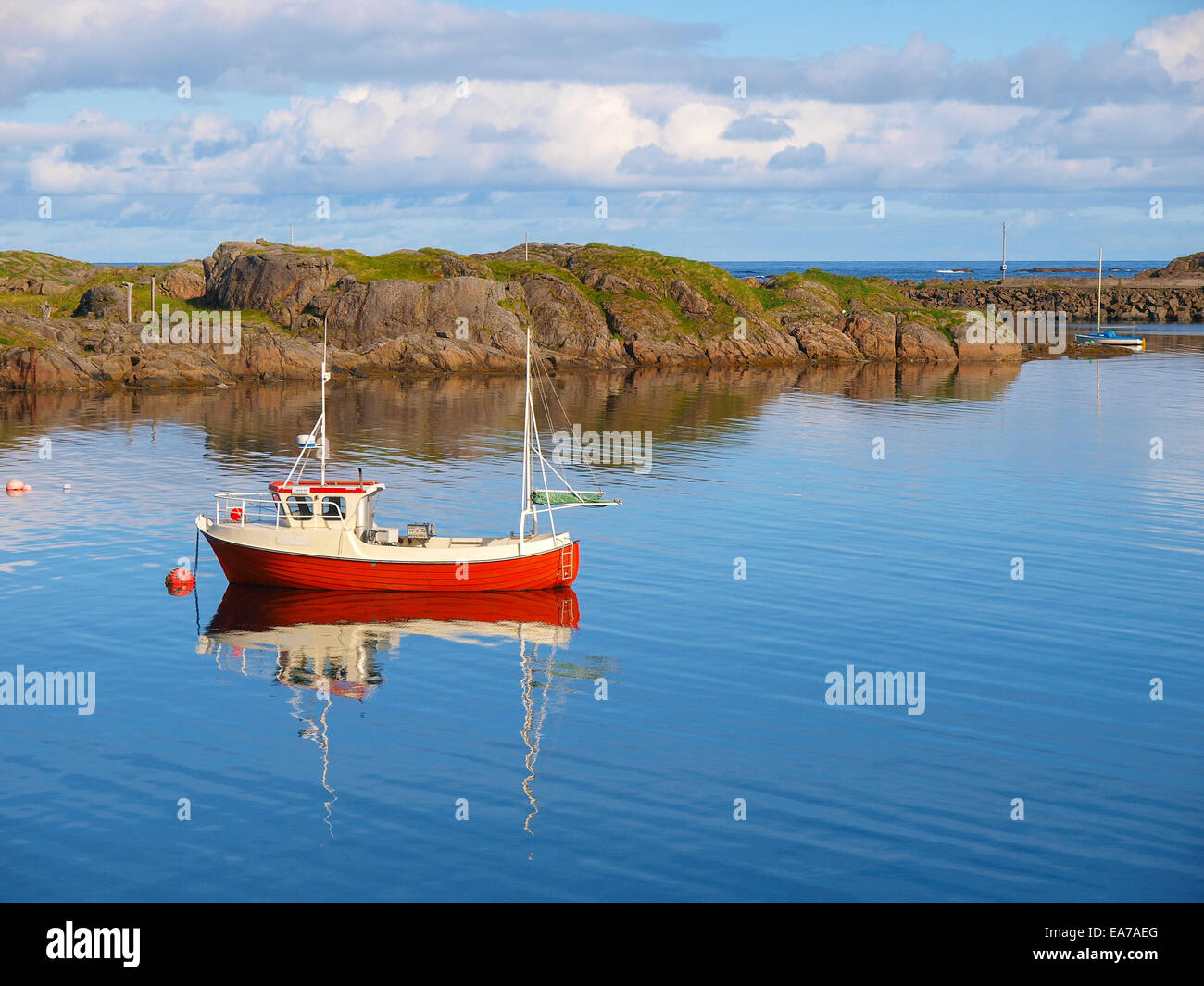 Norway, small boat in Reine harbour Stock Photo - Alamy