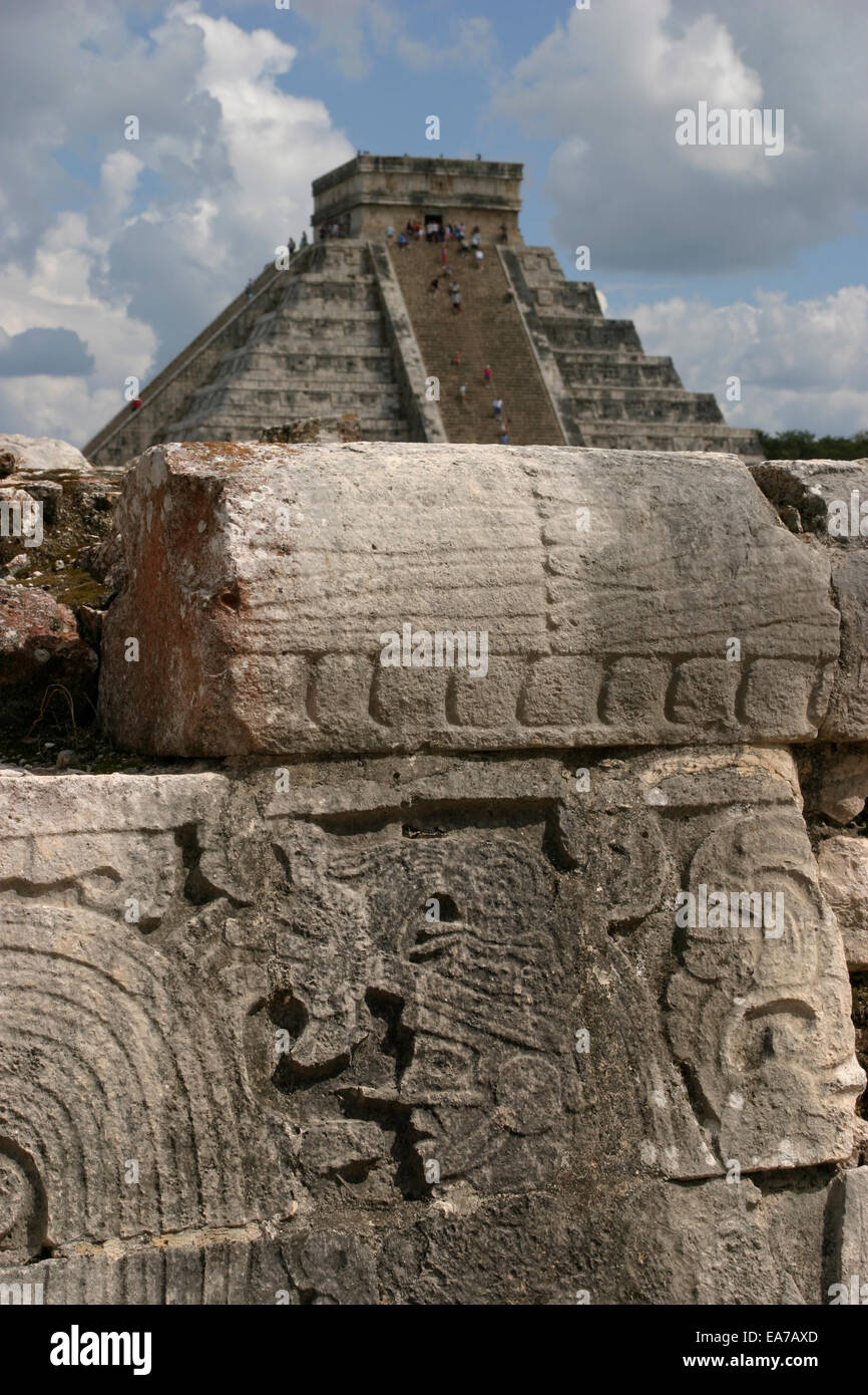 Mayan sculptures in front of the Temple of Kukulkan (El Castillo ...