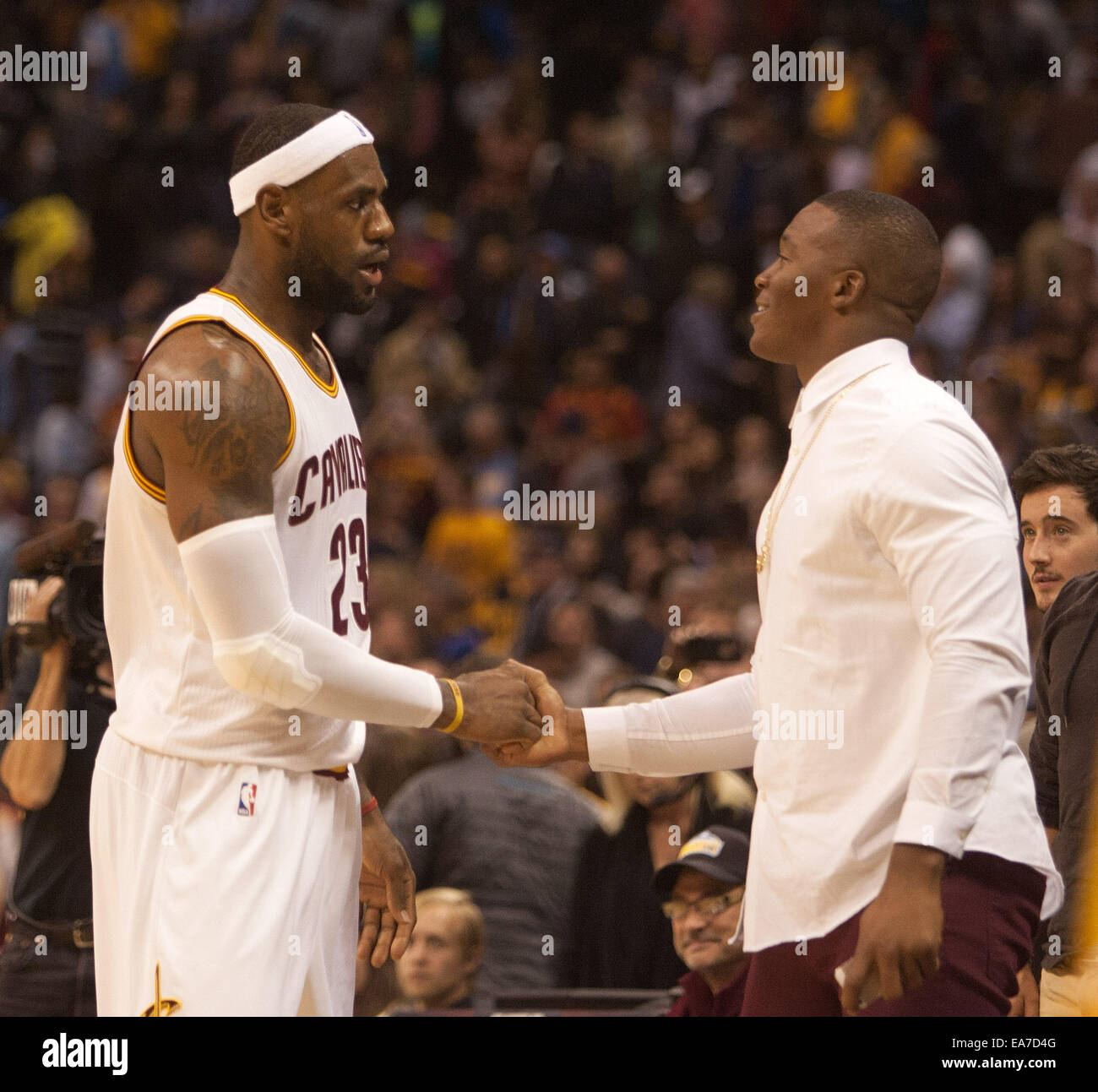Denver, Colorado, USA. 8th Nov, 2014. Cavs LEBRON JAMES, left, shakes ...