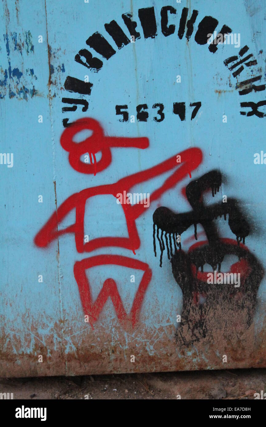 red funny man draw on blue metal bin Stock Photo - Alamy