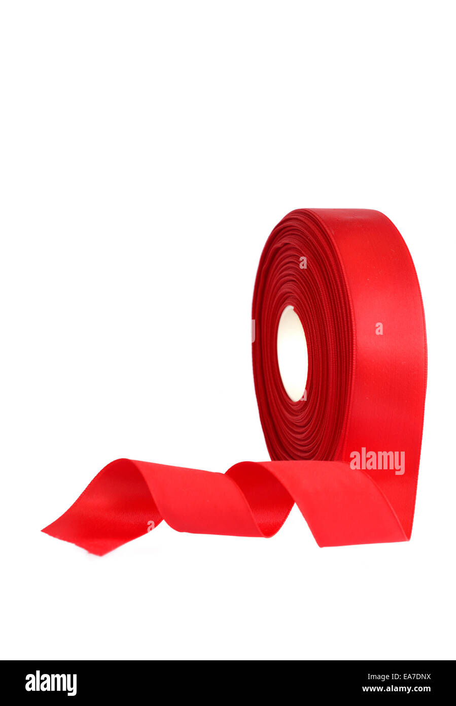 Red ribbon roll on a white background Stock Photo - Alamy