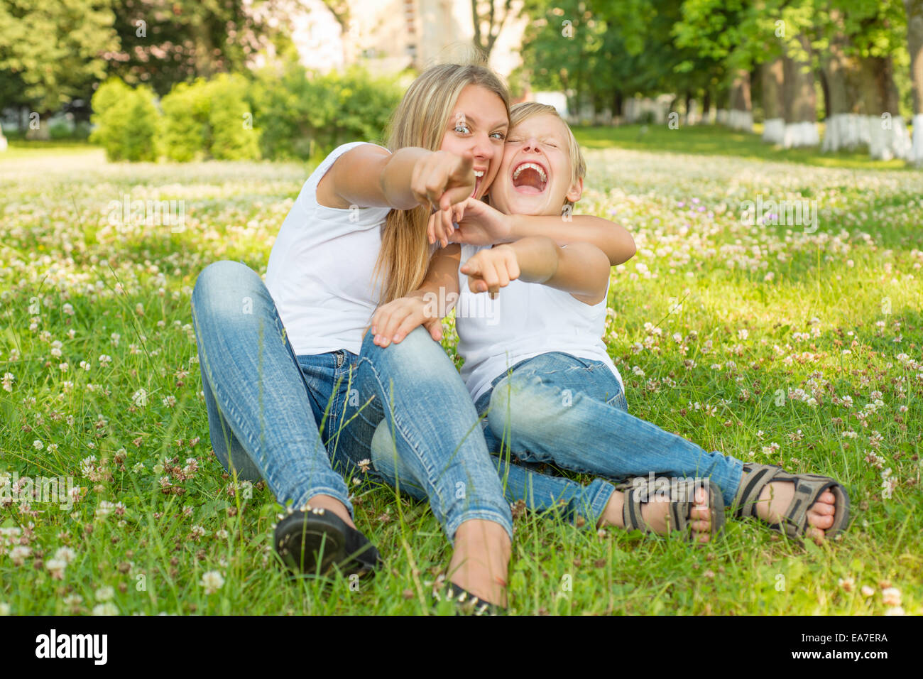 Children pointed the finger and laugh Stock Photo - Alamy