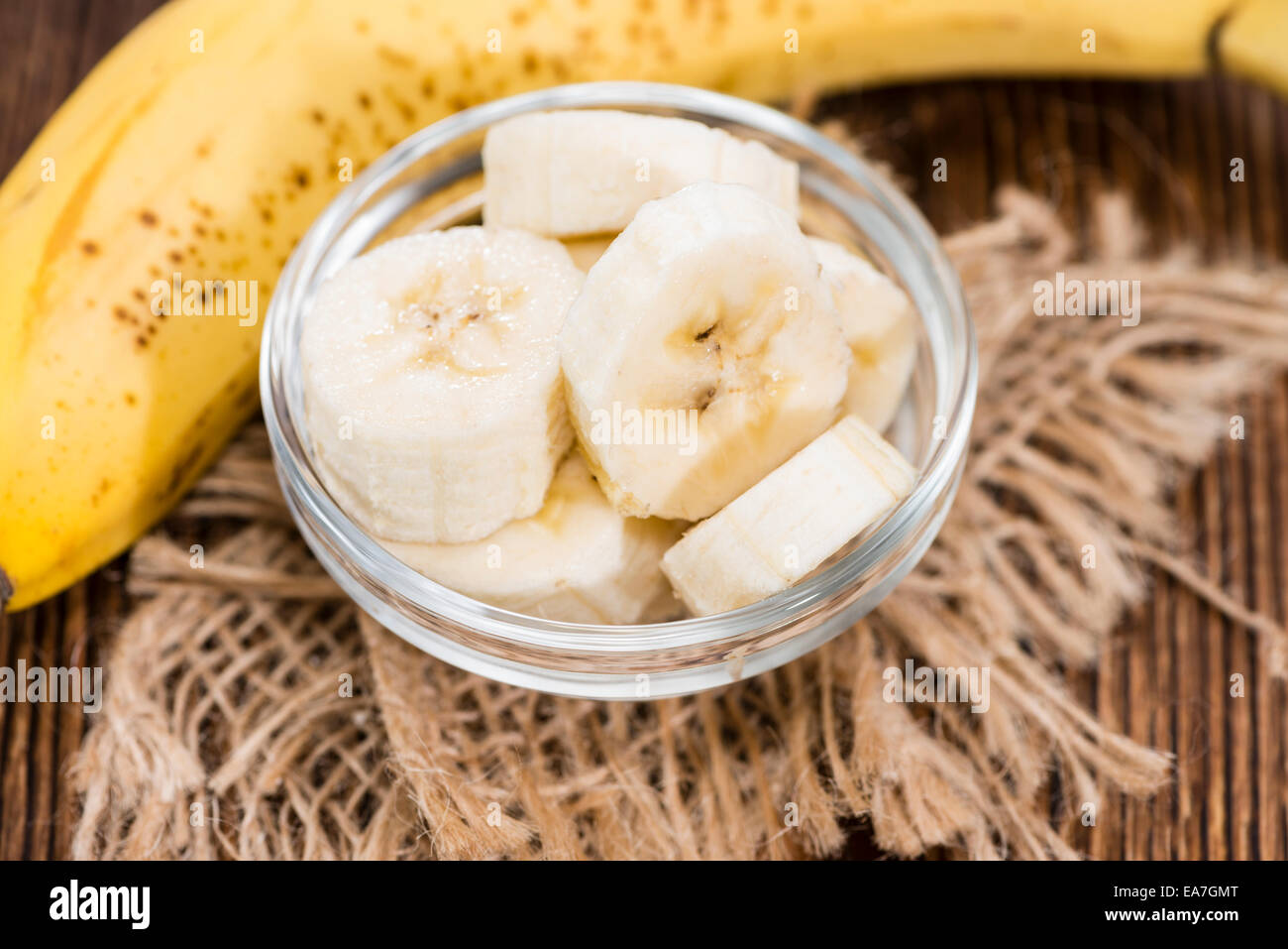 Banana Pieces in a bowl (close-up shot) with some fresh fruits Stock ...