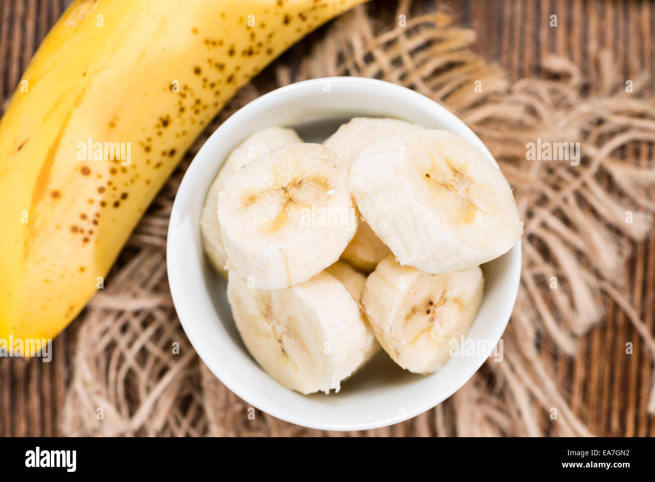 Banana Pieces in a bowl (close-up shot) with some fresh fruits Stock ...