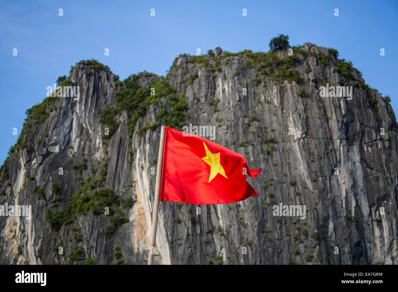 Vietnamese flag in Halong Bay, Vietnam Stock Photo - Alamy