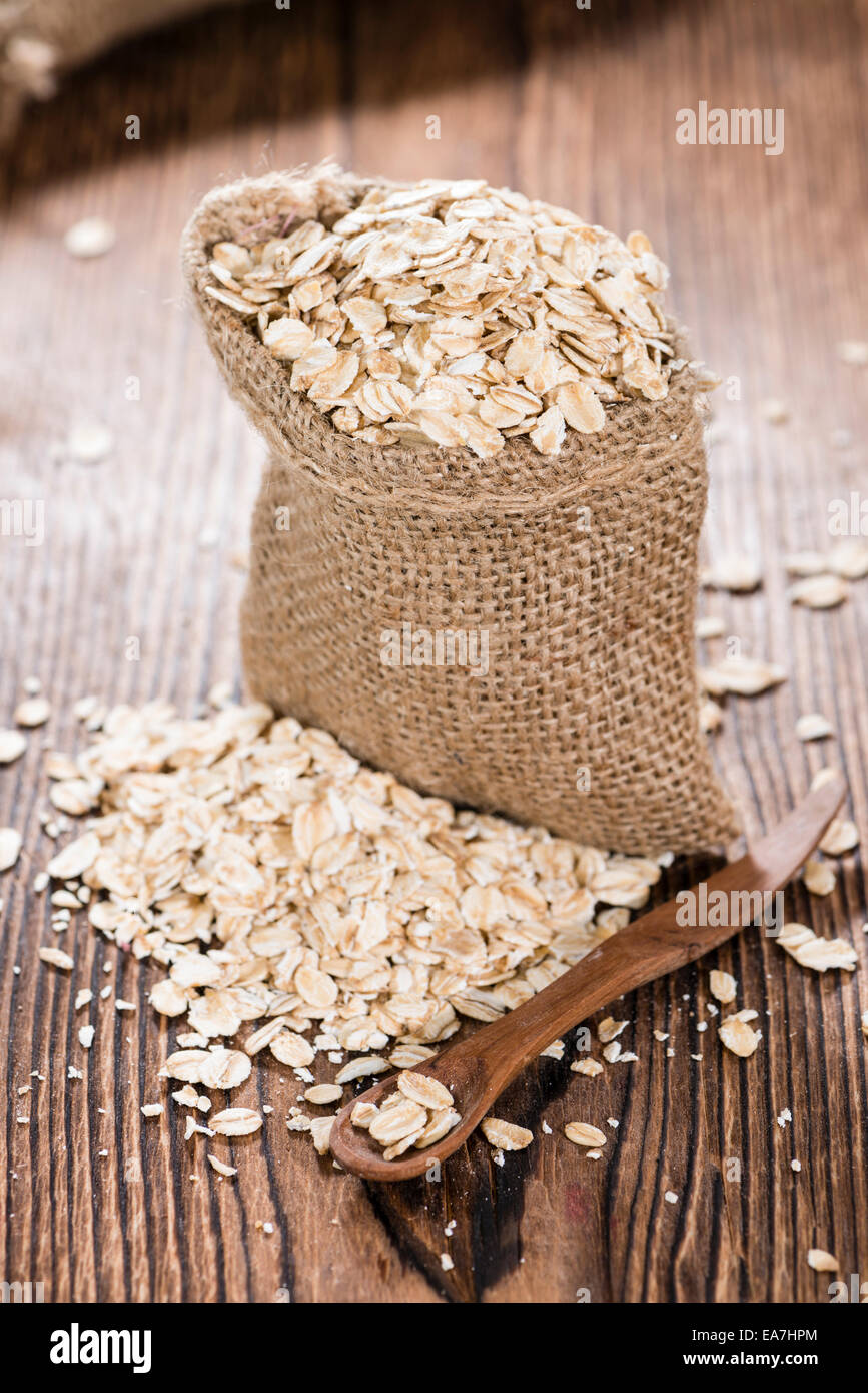 Portion of Oat on vintage wooden background (close-up shot Stock Photo ...