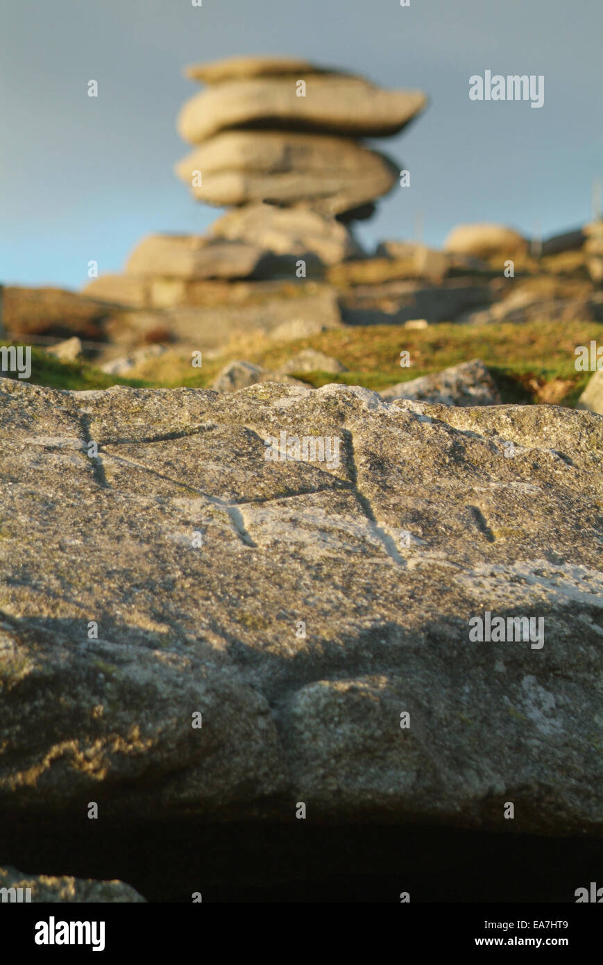 Daniel Gumps geometric carving on granite boulder in front of The ...
