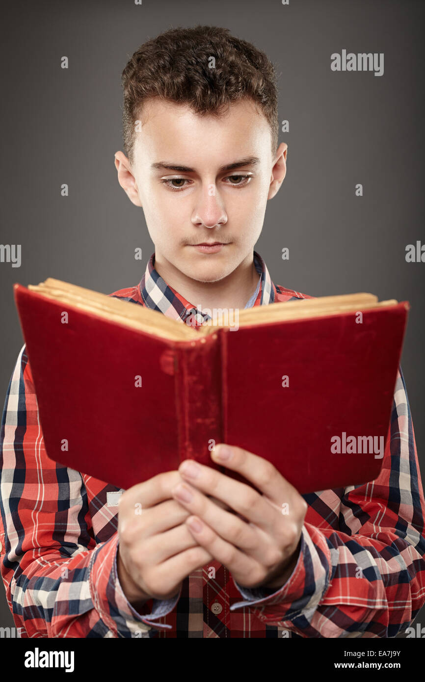 Teen Boy Reading A Book