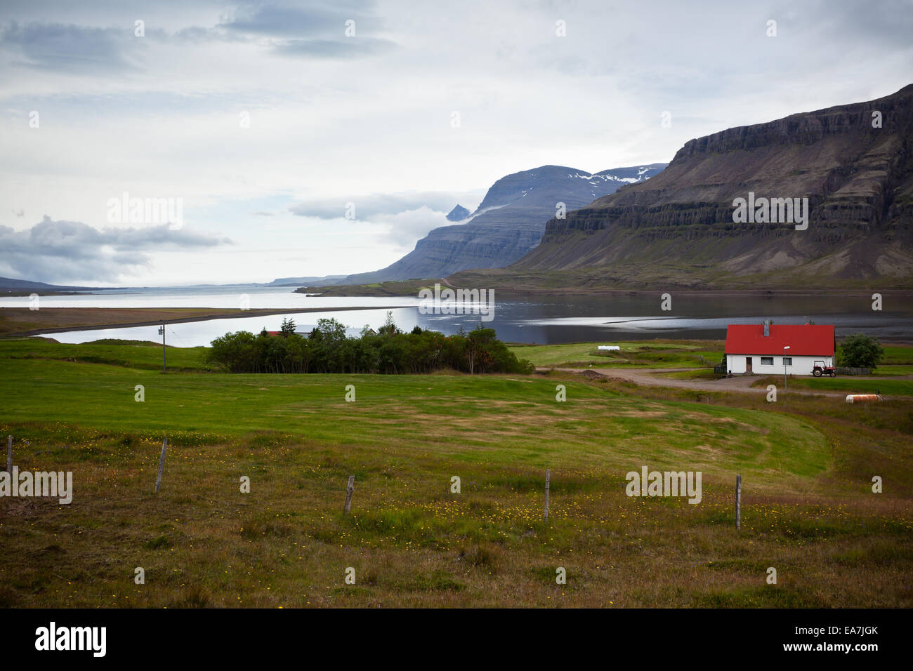East Iceland Nature Landscape with rocks range and house in Fjords ...