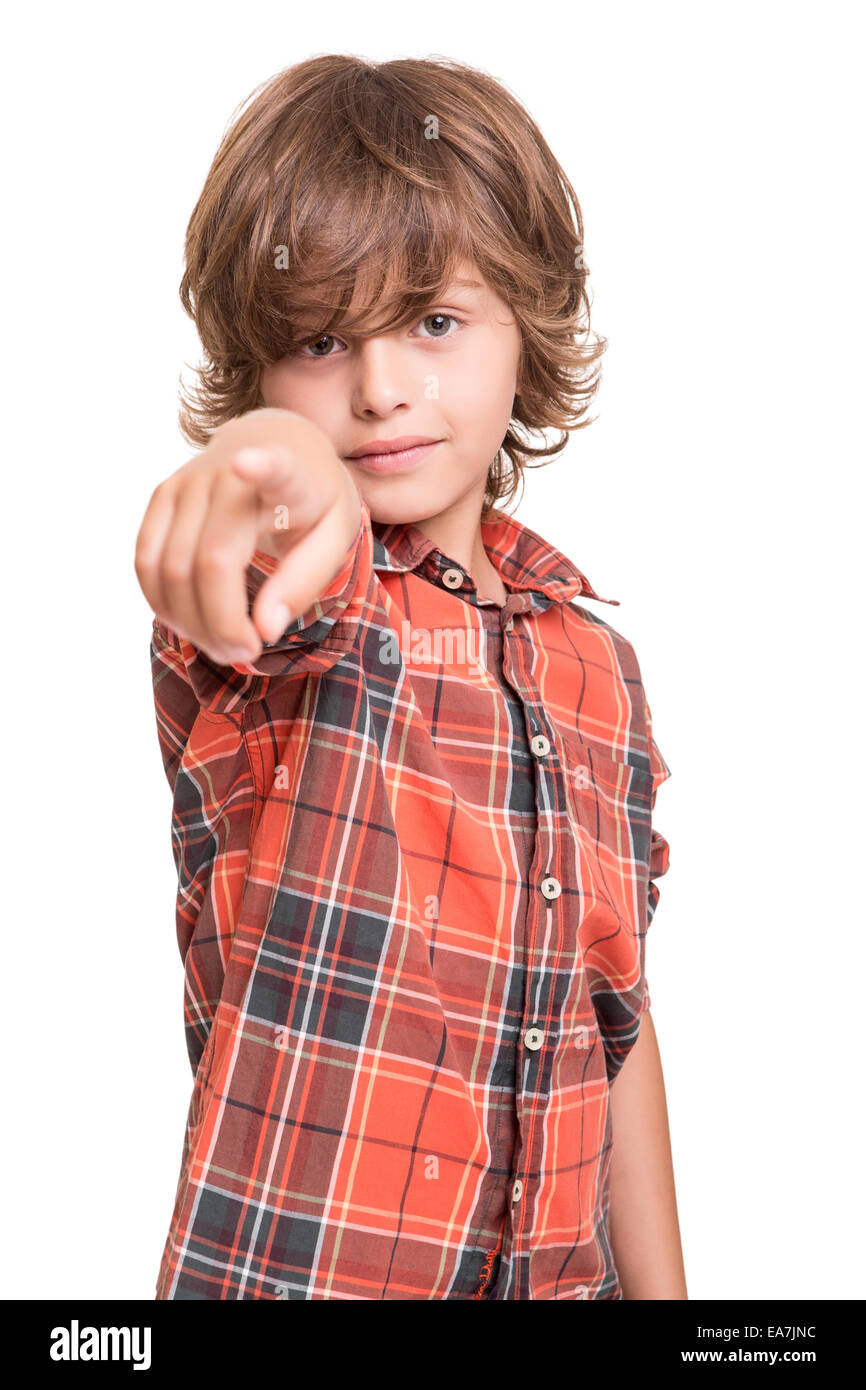 Cool young boy pointing front over white Stock Photo - Alamy