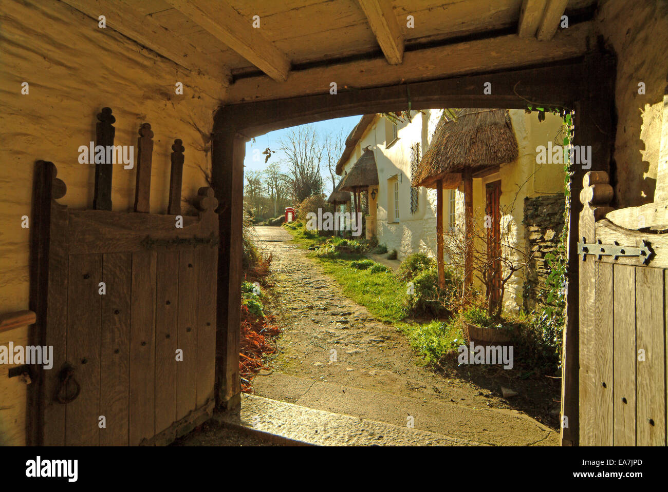 Trees along path leading to archway hi-res stock photography and images ...