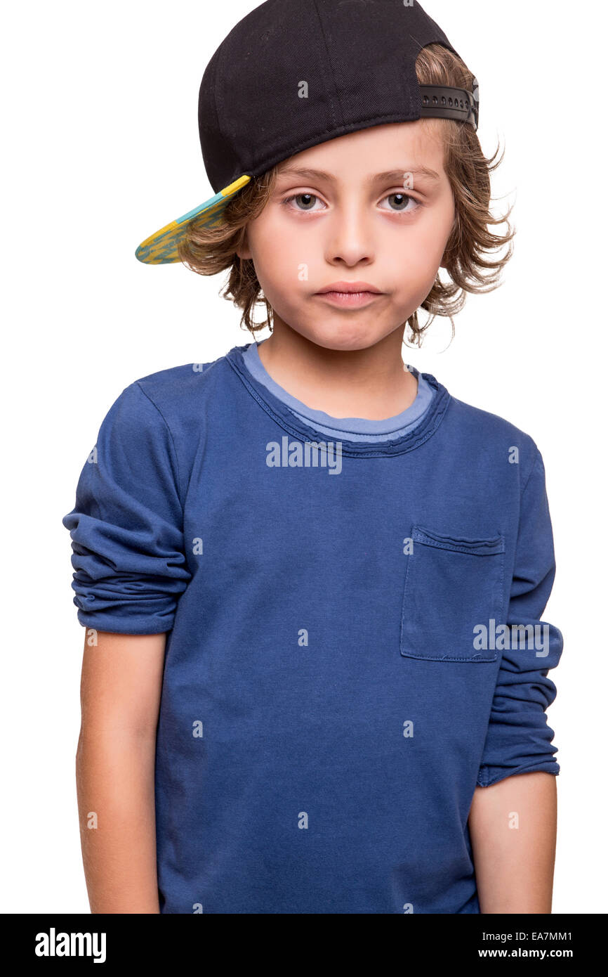 Cool young boy posing over white background Stock Photo - Alamy
