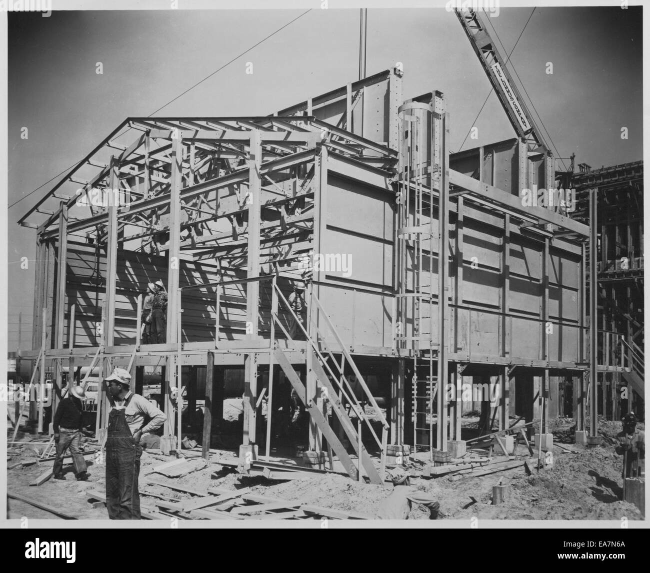 This photograph captures the construction of the Magnolia Petroleum ...