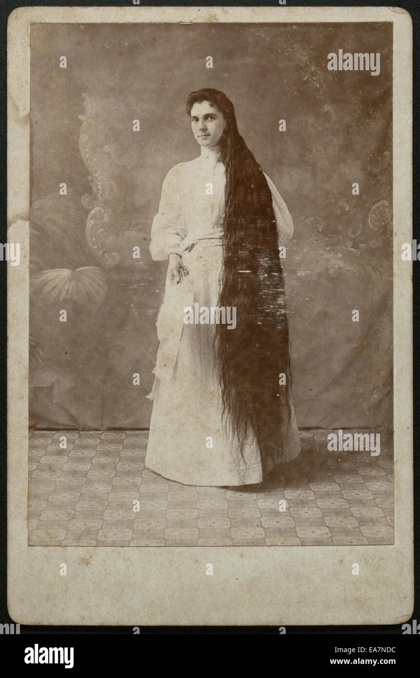 This 19th-century portrait of Emma Barker depicts her in a formal ...