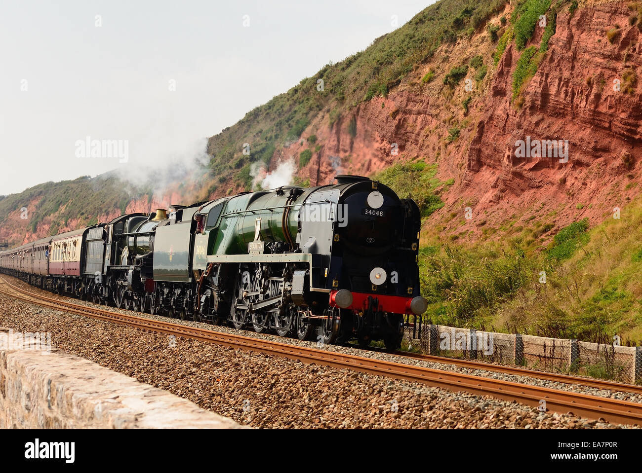 West Country class pacific No 34046 Braunton and GWR Castle class No ...