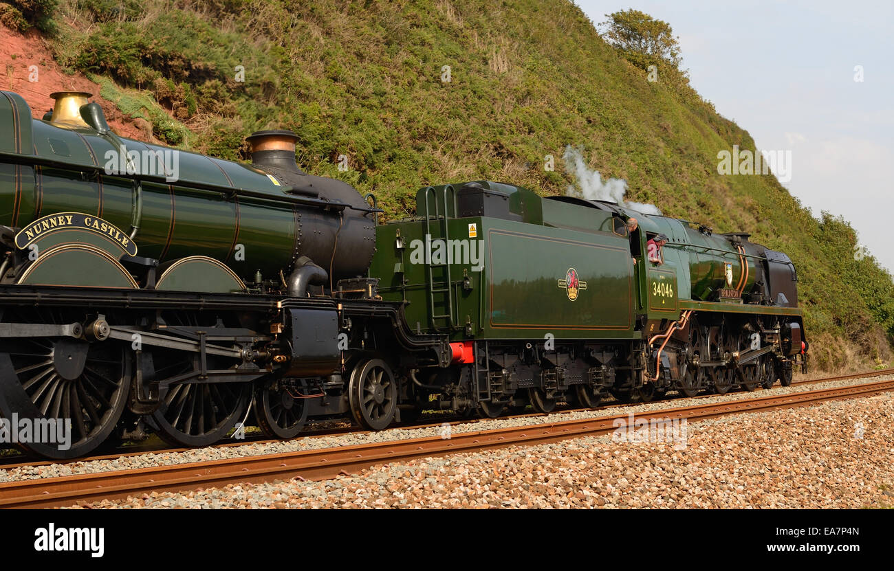 West Country class pacific No 34046 Braunton and GWR Castle class No ...