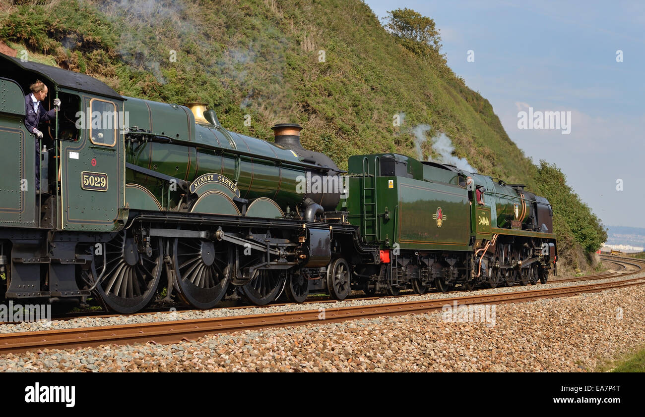 West Country class pacific No 34046 Braunton and GWR Castle class No ...
