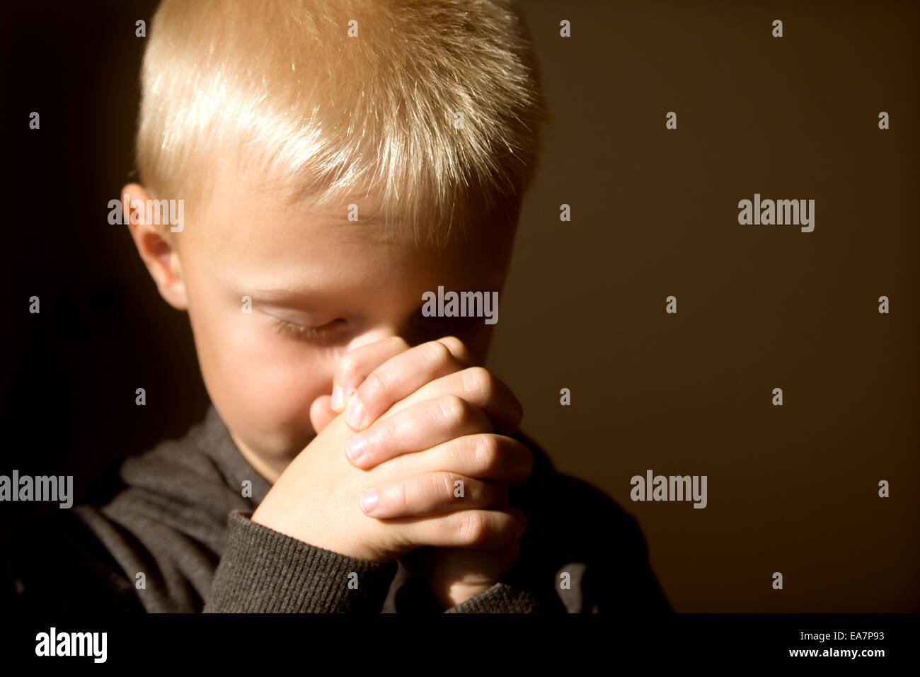 Little young beautiful boy (child, kid) spiritual peaceful praying and ...