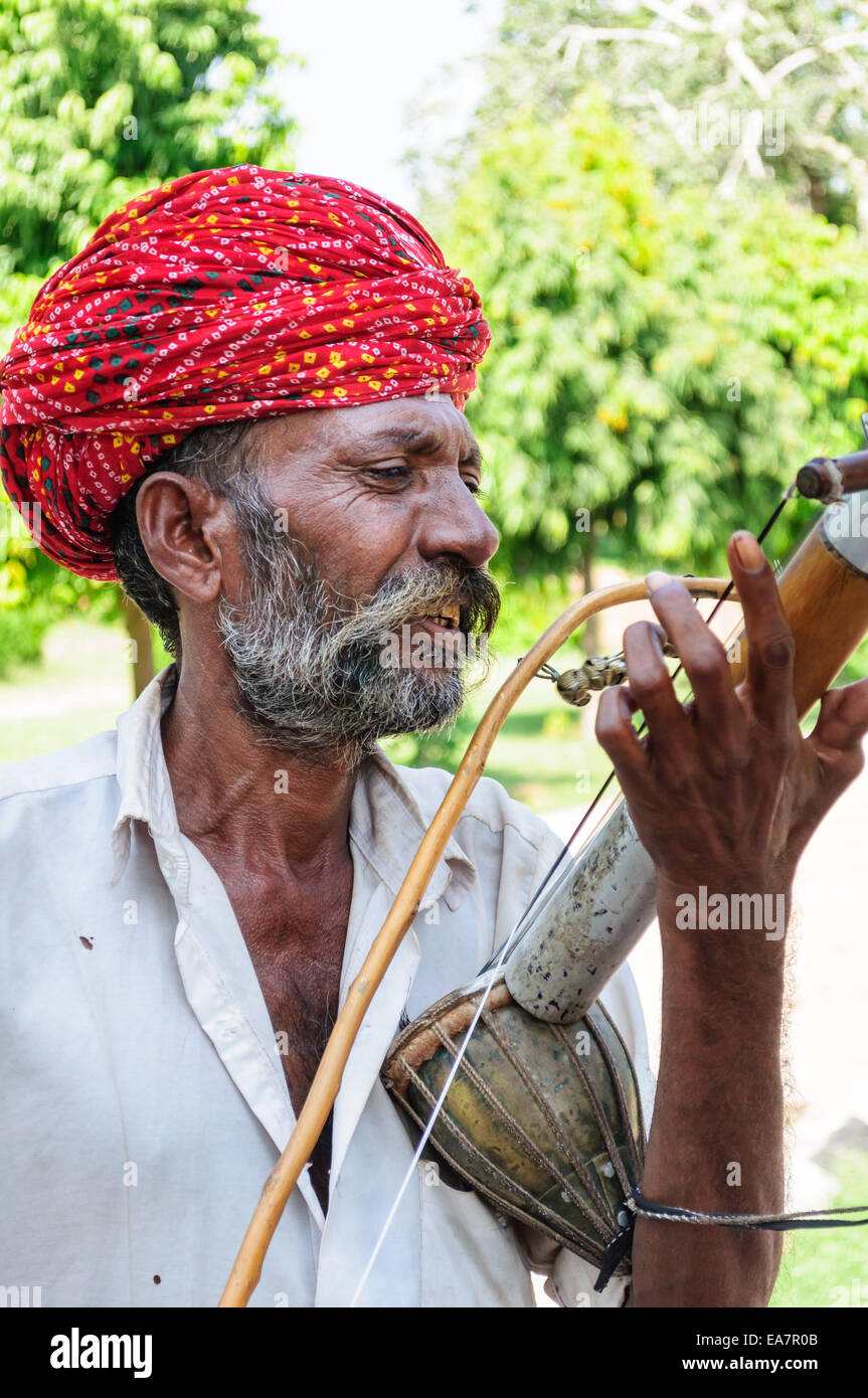 Old folk musician of Rajasthan playing Ravanhatha at Mador garden ...
