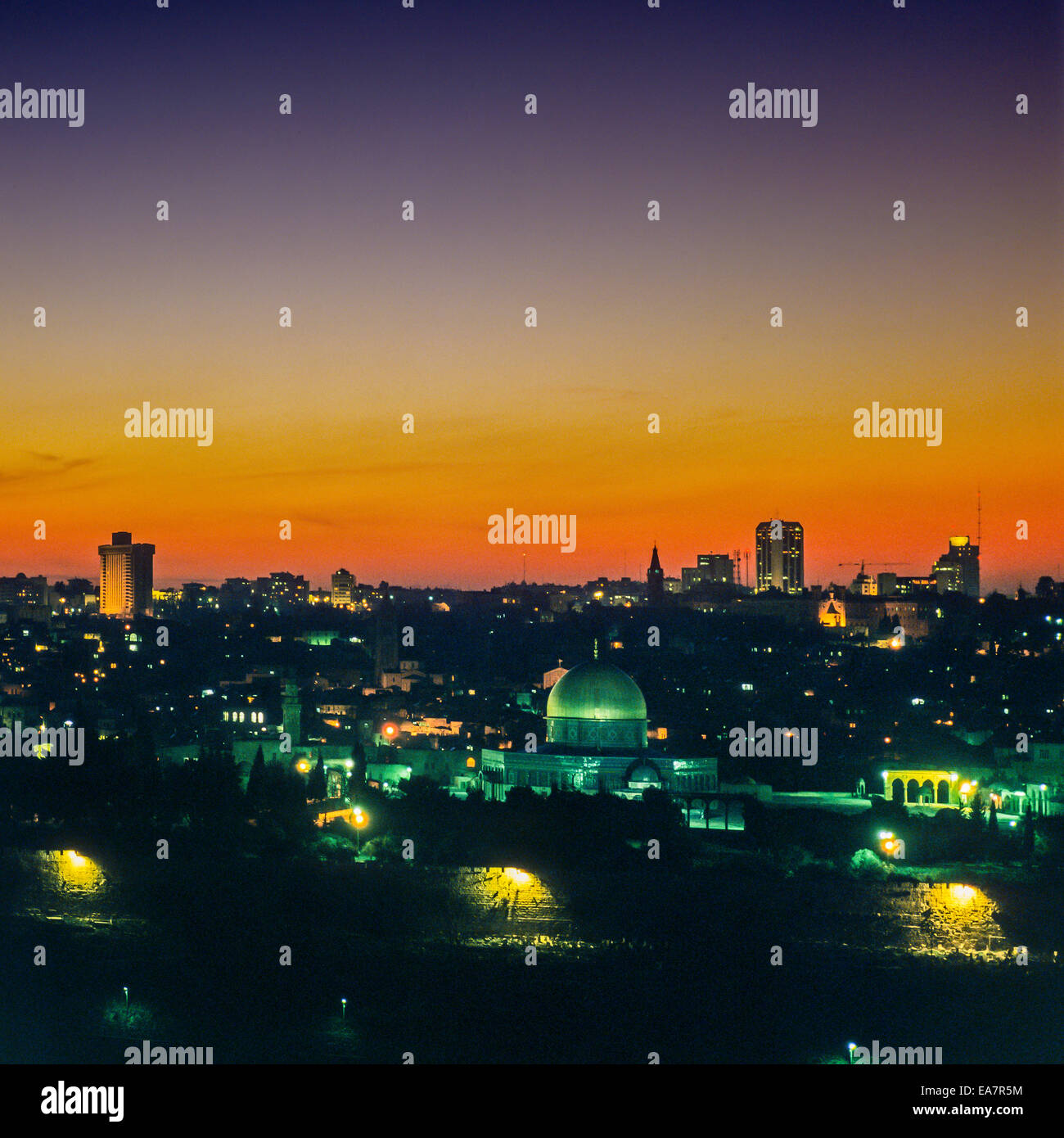 Old town and city skyline with illminated Dome of the Rock at night ...